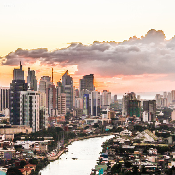 Sunset above the skyline of Makati City, Manila, Philippines in ...
